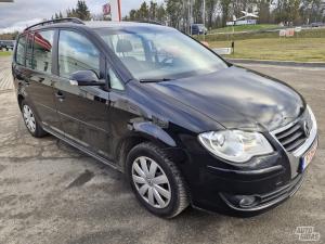 Black Volkswagen Touran 2009 in Utena, with an engine capacity of 1.90 L and mileage of 265 thousand km for 3950 €, photo 2 on AUTOMOTO.COM.LV