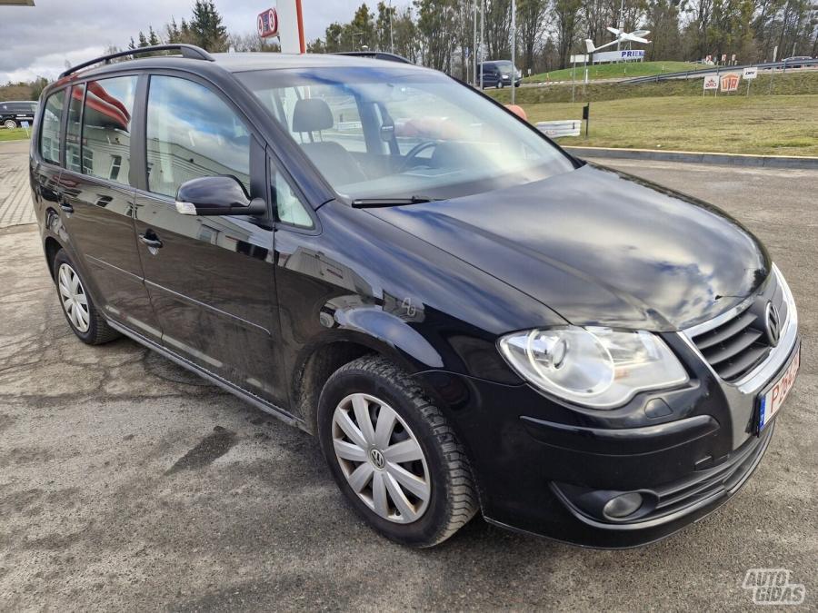 Black Volkswagen Touran 2009 in Utena, with an engine capacity of 1.90 L and mileage of 265 thousand km for 3950 €, photo 2 on AUTOMOTO.COM.LV