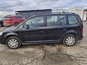 Black Volkswagen Touran 2009 in Utena, with an engine capacity of 1.90 L and mileage of 265 thousand km for 3950 €, photo 3 on AUTOMOTO.COM.LV