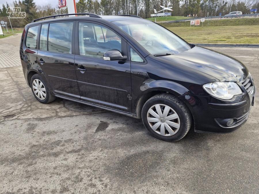 Black Volkswagen Touran 2009 in Utena, with an engine capacity of 1.90 L and mileage of 265 thousand km for 3950 €, photo 6 on AUTOMOTO.COM.LV