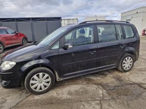 Black Volkswagen Touran 2009 in Utena, with an engine capacity of 1.90 L and mileage of 265 thousand km for 3950 €, photo 7 on AUTOMOTO.COM.LV