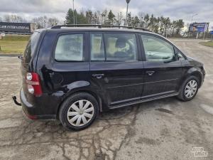 Black Volkswagen Touran 2009 in Utena, with an engine capacity of 1.90 L and mileage of 265 thousand km for 3950 €, photo 8 on AUTOMOTO.COM.LV