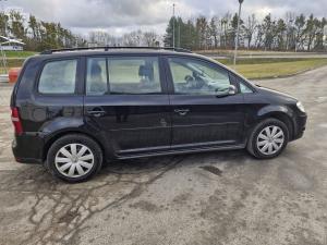 Black Volkswagen Touran 2009 in Utena, with an engine capacity of 1.90 L and mileage of 265 thousand km for 3950 €, photo 9 on AUTOMOTO.COM.LV