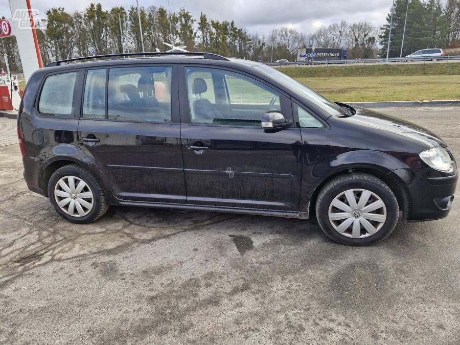 Black Volkswagen Touran 2009 in Utena, with an engine capacity of 1.90 L and mileage of 265 thousand km for 3950 €, photo 10 on AUTOMOTO.COM.LV