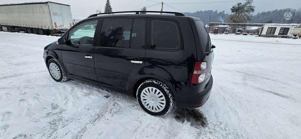 Black Volkswagen Touran 2009 in Prienai, with an engine capacity of 1.90 L and mileage of 255 thousand km for 3250 €, photo 4 on AUTOMOTO.COM.LV