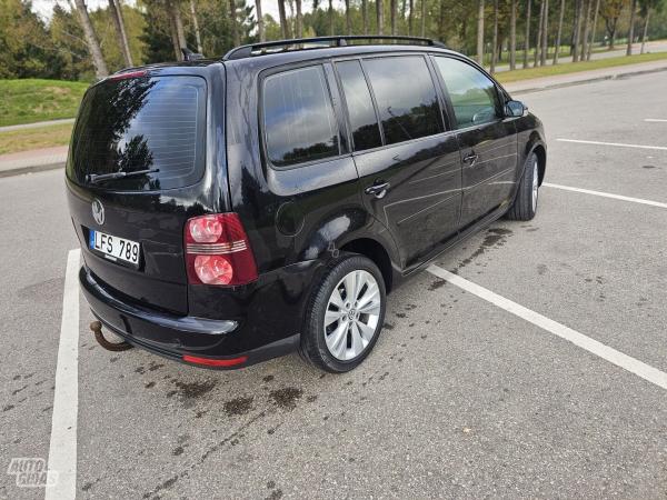 Black Volkswagen Touran 2009 in Salcininkai, with an engine capacity of 2.00 L and mileage of 340 thousand km for 3150 €, photo 3 on AUTOMOTO.COM.LV