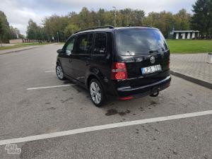 Black Volkswagen Touran 2009 in Salcininkai, with an engine capacity of 2.00 L and mileage of 340 thousand km for 3150 €, photo 4 on AUTOMOTO.COM.LV