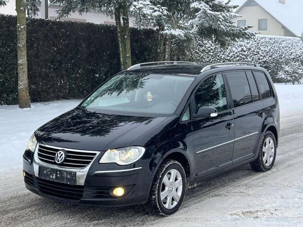 Melns Volkswagen Touran 2009 Kėdainiai, ar dzinēja tilpumu 1.40 L un nobraukumu 231 tūkst. km par 4199 €, foto 1 vietnē AUTOMOTO.COM.LV