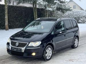 Black Volkswagen Touran 2009 in Kedainiai, with an engine capacity of 1.40 L and mileage of 231 thousand km for 4199 €, photo  on AUTOMOTO.COM.LV