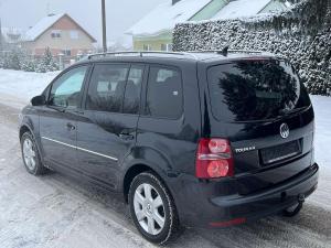 Black Volkswagen Touran 2009 in Kedainiai, with an engine capacity of 1.40 L and mileage of 231 thousand km for 4199 €, photo 4 on AUTOMOTO.COM.LV