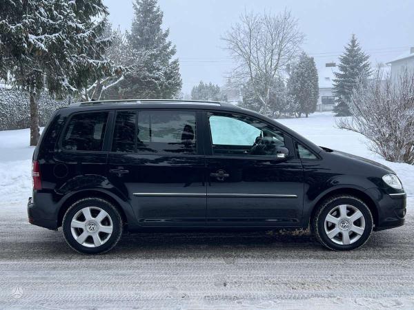 Melns Volkswagen Touran 2009 Kėdainiai, ar dzinēja tilpumu 1.40 L un nobraukumu 231 tūkst. km par 4199 €, foto 5 vietnē AUTOMOTO.COM.LV