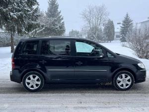 Black Volkswagen Touran 2009 in Kedainiai, with an engine capacity of 1.40 L and mileage of 231 thousand km for 4199 €, photo 5 on AUTOMOTO.COM.LV