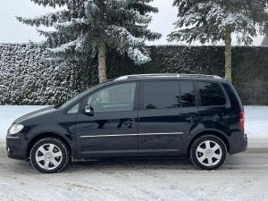 Black Volkswagen Touran 2009 in Kedainiai, with an engine capacity of 1.40 L and mileage of 231 thousand km for 4199 €, photo 6 on AUTOMOTO.COM.LV