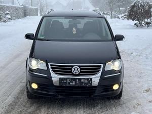 Black Volkswagen Touran 2009 in Kedainiai, with an engine capacity of 1.40 L and mileage of 231 thousand km for 4199 €, photo 7 on AUTOMOTO.COM.LV