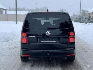 Black Volkswagen Touran 2009 in Kedainiai, with an engine capacity of 1.40 L and mileage of 231 thousand km for 4199 €, photo 9 on AUTOMOTO.COM.LV