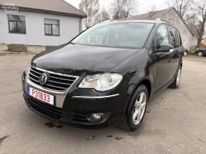Black Volkswagen Touran 2009 in Kaunas, with an engine capacity of 2.00 L and mileage of 404 thousand km for 3100 €, photo  on AUTOMOTO.COM.LV