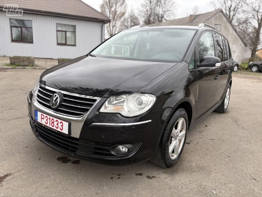 Black Volkswagen Touran 2009 in Kaunas, with an engine capacity of 2.00 L and mileage of 404 thousand km for 3100 €, photo 1 on AUTOMOTO.COM.LV