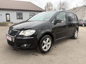 Black Volkswagen Touran 2009 in Kaunas, with an engine capacity of 2.00 L and mileage of 404 thousand km for 3100 €, photo 3 on AUTOMOTO.COM.LV