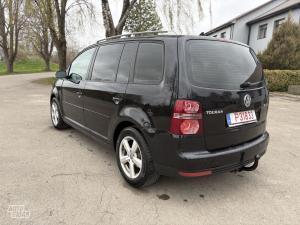 Black Volkswagen Touran 2009 in Kaunas, with an engine capacity of 2.00 L and mileage of 404 thousand km for 3100 €, photo 9 on AUTOMOTO.COM.LV