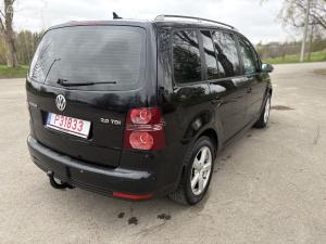 Black Volkswagen Touran 2009 in Kaunas, with an engine capacity of 2.00 L and mileage of 404 thousand km for 3100 €, photo 13 on AUTOMOTO.COM.LV
