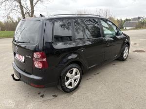Black Volkswagen Touran 2009 in Kaunas, with an engine capacity of 2.00 L and mileage of 404 thousand km for 3100 €, photo 14 on AUTOMOTO.COM.LV