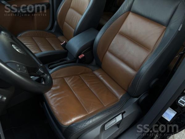 Melns Volkswagen Touran 2009 Jelgava, ar dzinēja tilpumu 2.00 L un nobraukumu 230 tūkst. km par 4700 €, foto 10 vietnē AUTOMOTO.COM.LV