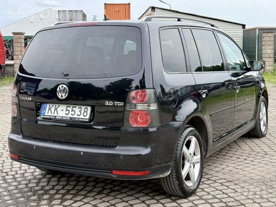 Black Volkswagen Touran 2009 in Riga, with an engine capacity of 2.00 L and mileage of 341 thousand km for 2300 €, photo 4 on AUTOMOTO.COM.LV