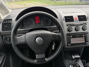 Black Volkswagen Touran 2009 in Riga, with an engine capacity of 2.00 L and mileage of 341 thousand km for 2300 €, photo 7 on AUTOMOTO.COM.LV