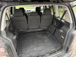 Black Volkswagen Touran 2009 in Riga, with an engine capacity of 2.00 L and mileage of 341 thousand km for 2300 €, photo 10 on AUTOMOTO.COM.LV