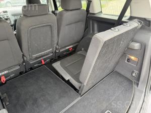 Black Volkswagen Touran 2009 in Riga, with an engine capacity of 2.00 L and mileage of 341 thousand km for 2300 €, photo 11 on AUTOMOTO.COM.LV