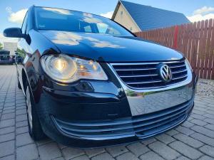 Melns Volkswagen Touran 2009 Marijampole, ar dzinēja tilpumu 1.90 L un nobraukumu 139 tūkst. km par 3599 €, foto 4 vietnē AUTOMOTO.COM.LV
