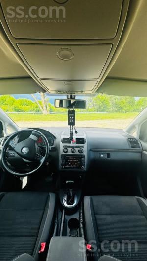 Melns Volkswagen Touran 2009 Daugavpils, ar dzinēja tilpumu 1.90 L un nobraukumu 260 tūkst. km par 3500 €, foto 9 vietnē AUTOMOTO.COM.LV