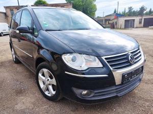 Melns Volkswagen Touran 2009 Utena, ar dzinēja tilpumu 1.97 L un nobraukumu 279 tūkst. km par 3850 €, foto  vietnē AUTOMOTO.COM.LV