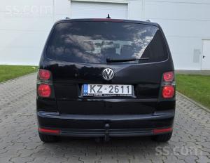 Black Volkswagen Touran 2009 in Riga, with an engine capacity of 1.40 L and mileage of 230 thousand km for 3850 €, photo 4 on AUTOMOTO.COM.LV