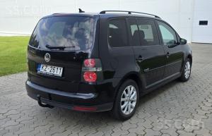 Black Volkswagen Touran 2009 in Riga, with an engine capacity of 1.40 L and mileage of 230 thousand km for 3850 €, photo 7 on AUTOMOTO.COM.LV