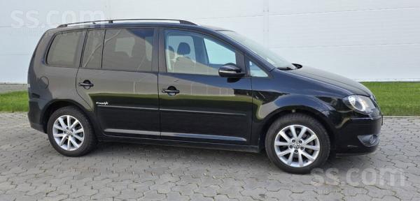 Black Volkswagen Touran 2009 in Riga, with an engine capacity of 1.40 L and mileage of 230 thousand km for 3850 €, photo 7 on AUTOMOTO.COM.LV