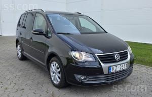 Black Volkswagen Touran 2009 in Riga, with an engine capacity of 1.40 L and mileage of 230 thousand km for 3850 €, photo 9 on AUTOMOTO.COM.LV