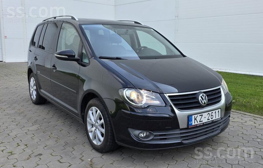 Black Volkswagen Touran 2009 in Riga, with an engine capacity of 1.40 L and mileage of 230 thousand km for 3850 €, photo 9 on AUTOMOTO.COM.LV