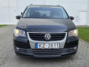 Black Volkswagen Touran 2009 in Riga, with an engine capacity of 1.40 L and mileage of 230 thousand km for 3850 €, photo 10 on AUTOMOTO.COM.LV