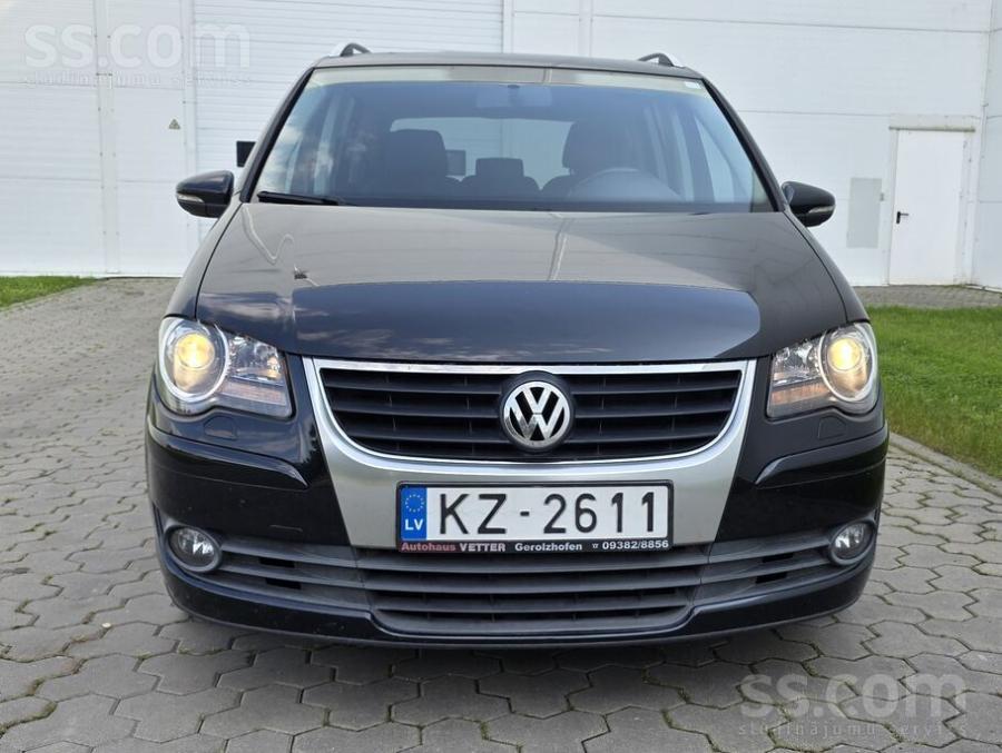 Black Volkswagen Touran 2009 in Riga, with an engine capacity of 1.40 L and mileage of 230 thousand km for 3850 €, photo 10 on AUTOMOTO.COM.LV
