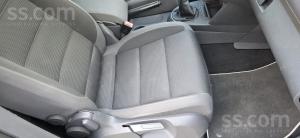 Black Volkswagen Touran 2009 in Riga, with an engine capacity of 1.40 L and mileage of 230 thousand km for 3850 €, photo 13 on AUTOMOTO.COM.LV