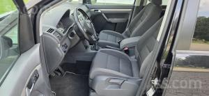 Black Volkswagen Touran 2009 in Riga, with an engine capacity of 1.40 L and mileage of 230 thousand km for 3850 €, photo 15 on AUTOMOTO.COM.LV