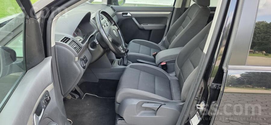 Black Volkswagen Touran 2009 in Riga, with an engine capacity of 1.40 L and mileage of 230 thousand km for 3850 €, photo 15 on AUTOMOTO.COM.LV