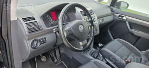 Black Volkswagen Touran 2009 in Riga, with an engine capacity of 1.40 L and mileage of 230 thousand km for 3850 €, photo 16 on AUTOMOTO.COM.LV