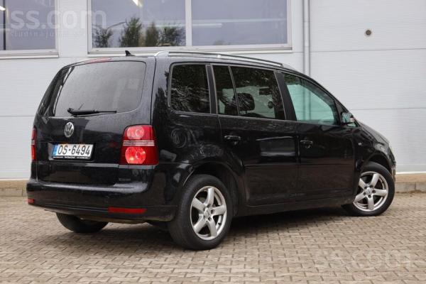 Melns Volkswagen Touran 2009 Rīga, ar dzinēja tilpumu 2.00 L un nobraukumu 293 tūkst. km par 5495 €, foto 8 vietnē AUTOMOTO.COM.LV