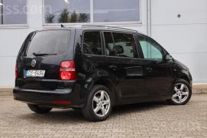 Black Volkswagen Touran 2009 in Riga, with an engine capacity of 2.00 L and mileage of 293 thousand km for 5495 €, photo 8 on AUTOMOTO.COM.LV