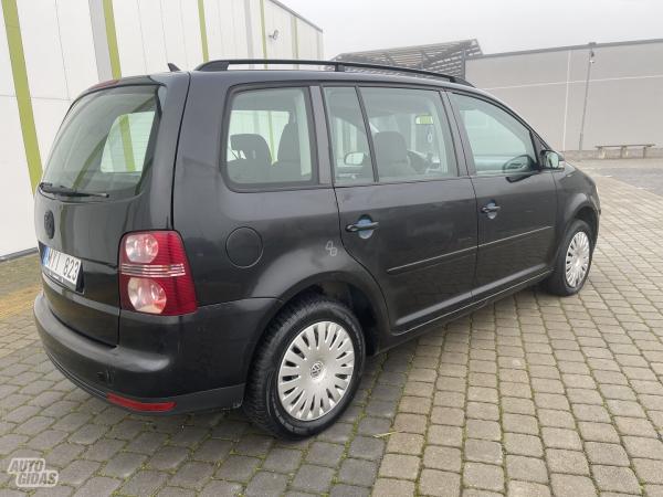 Melns Volkswagen Touran 2009 Raseiniai, ar dzinēja tilpumu 1.90 L un nobraukumu 330 tūkst. km par 1950 €, foto 10 vietnē AUTOMOTO.COM.LV