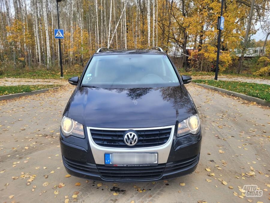 Black Volkswagen Touran 2009 in Vilnius, with an engine capacity of 2.00 L and mileage of 337 thousand km for 1950 €, photo 3 on AUTOMOTO.COM.LV