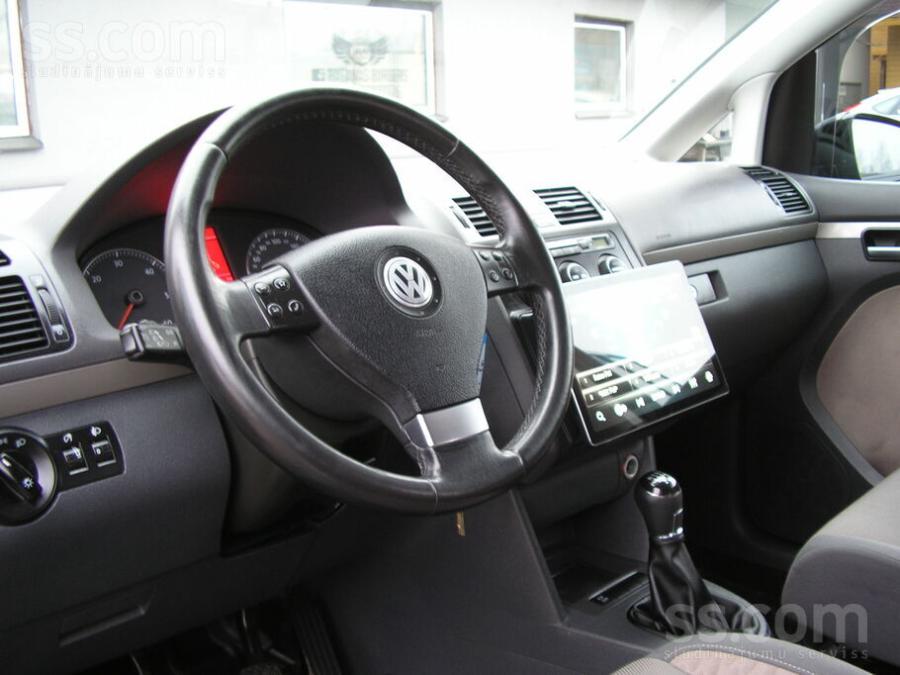 Black Volkswagen Touran 2010 in Riga, with an engine capacity of 1.90 L and mileage of 0 thousand km for 5850 €, photo 15 on AUTOMOTO.COM.LV