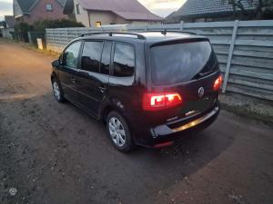 Black Volkswagen Touran 2010 in Panevezys, with an engine capacity of 1.60 L and mileage of 317 thousand km for 3600 €, photo 5 on AUTOMOTO.COM.LV